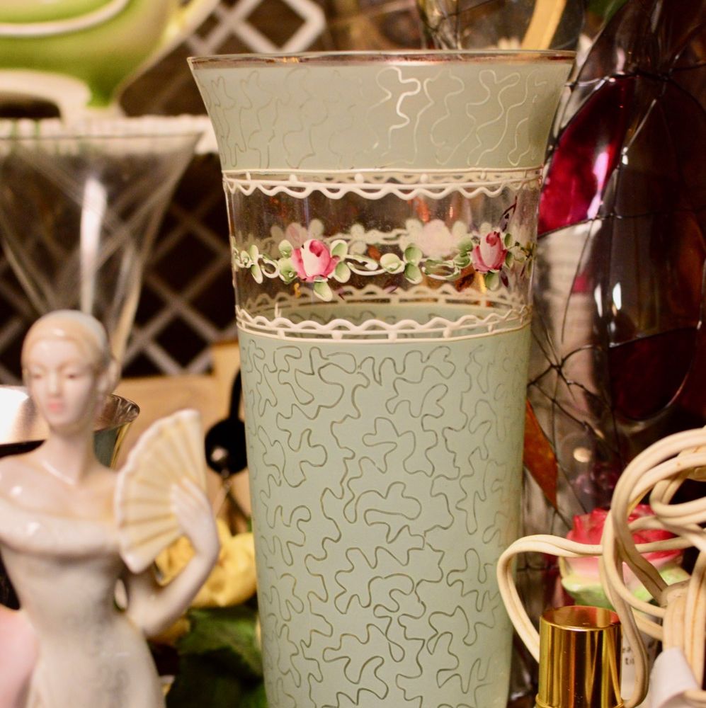 Antique vase with roses